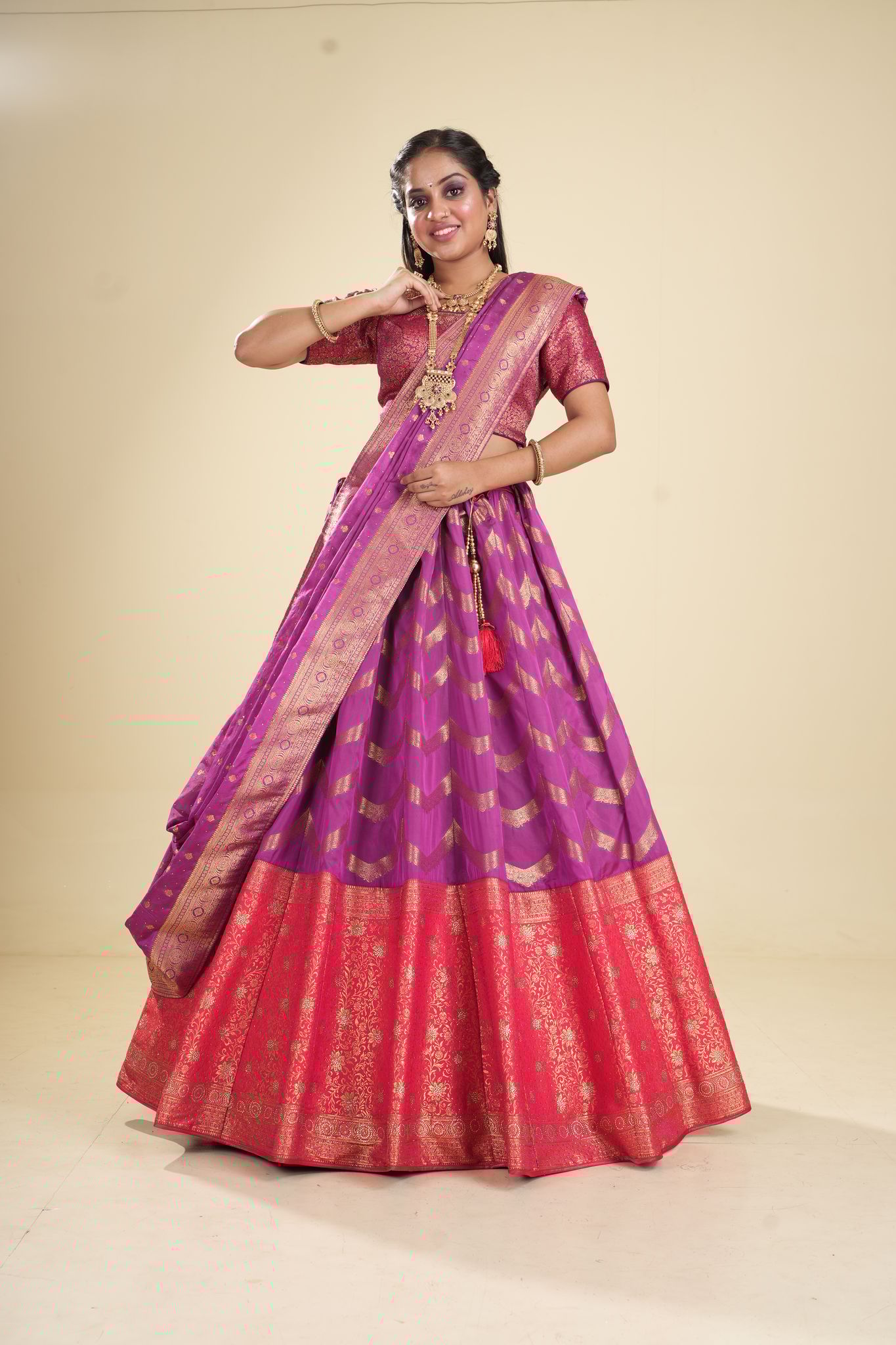 Latest Fashion Trend With A Rani And Purple Pattu Pavadai